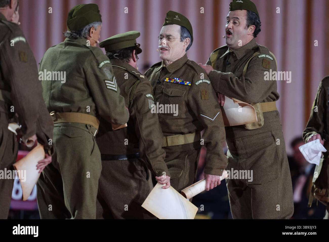Kevin Eldon (second right) as Lance Corporal Jones and Daniel Mays ...