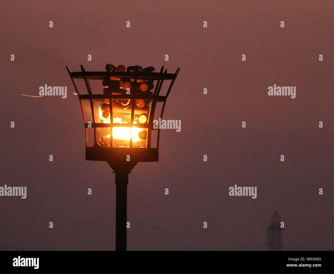 Queenborough, Kent, UK. 8th May, 2025. 80th VE Day: the lighting of the ...