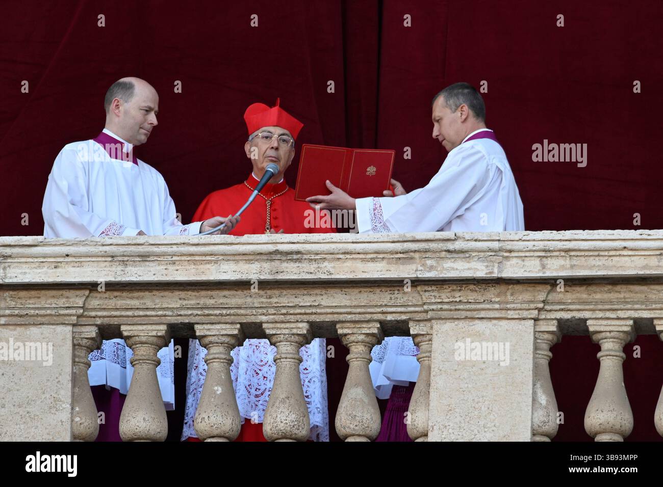 Italy. 08th May, 2025. French Cardinal Protodeacon Dominique Mamberti (C) announces the name of ...