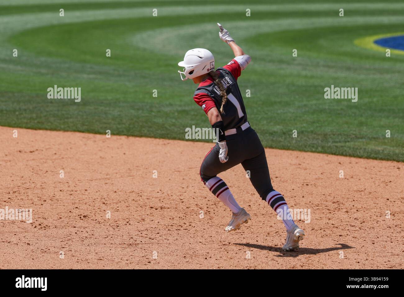 ATHENS, GA - MAY 08: Arkansas utility Raigan Kramer (1) holds up the ...