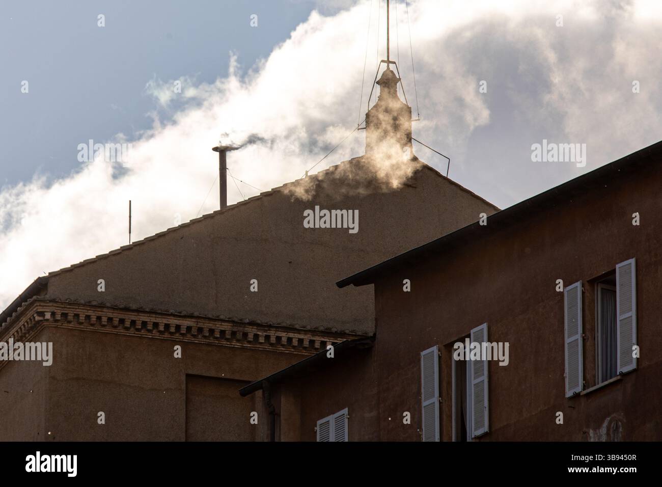 VATICAN CITY – 9 May 2025: White smoke rises from the chimney of the ...