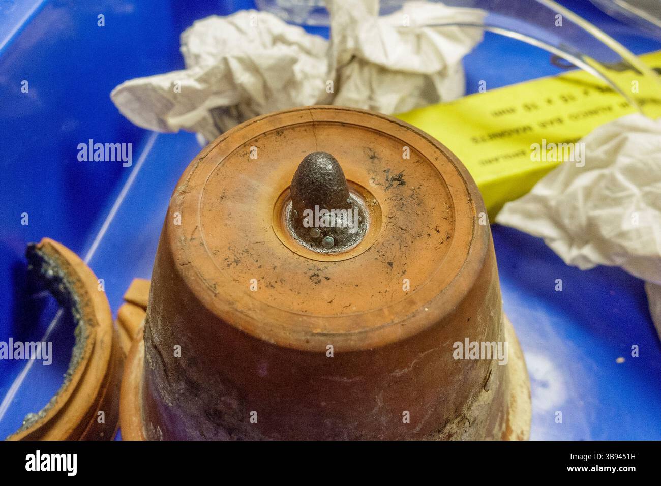 The terracotta pot remains following a thermite reaction (iron (III ...