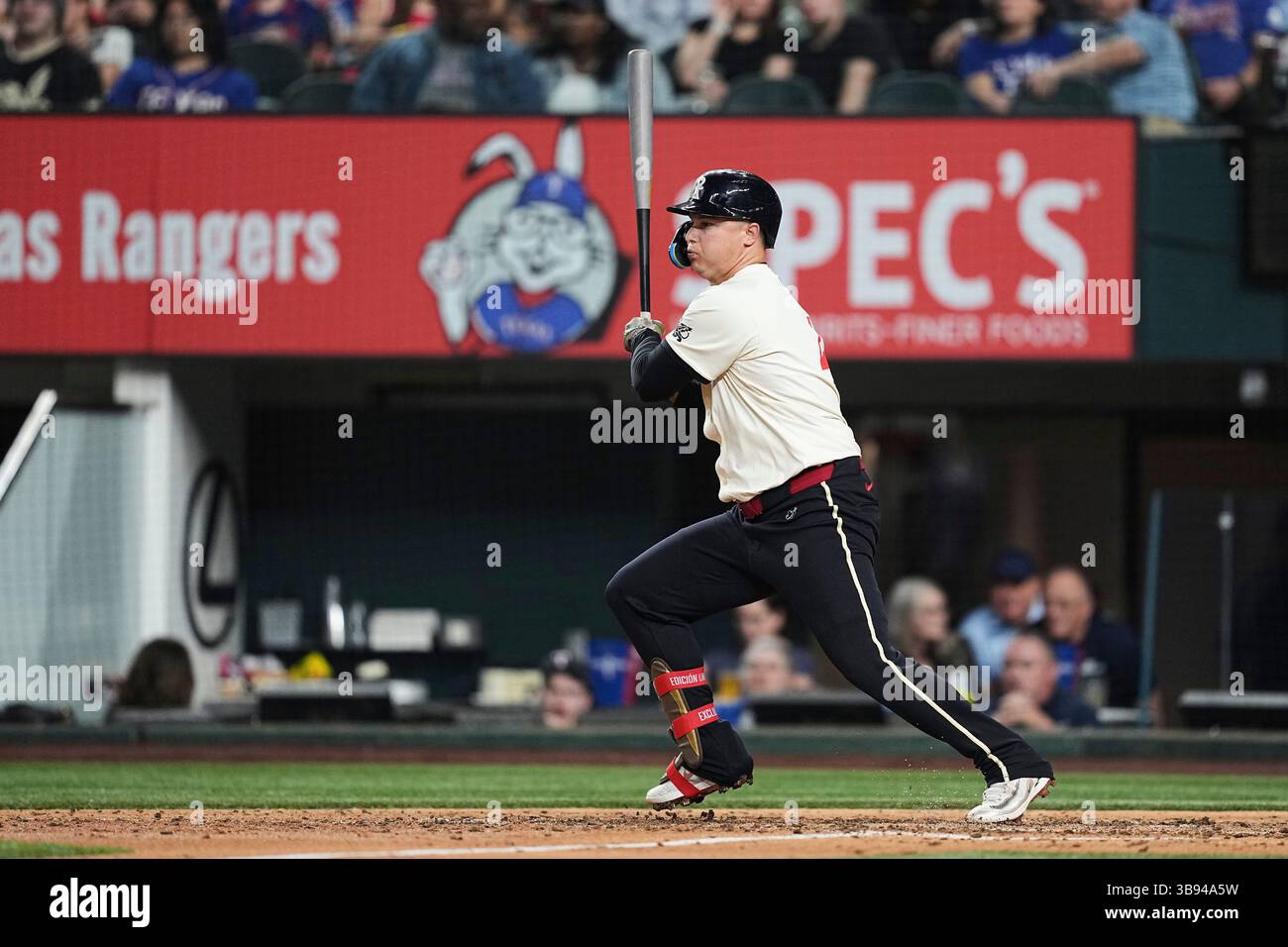 Texas Rangers' Joc Pederson follows through on a swing during a ...