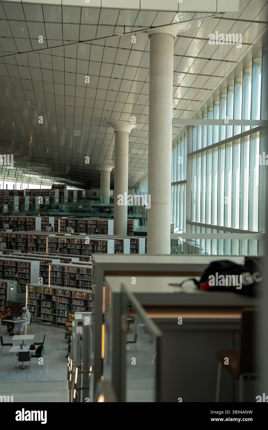 Futuristic and clean modern library in Doha, Qatar. Sleek architecture design with hundreds of ...