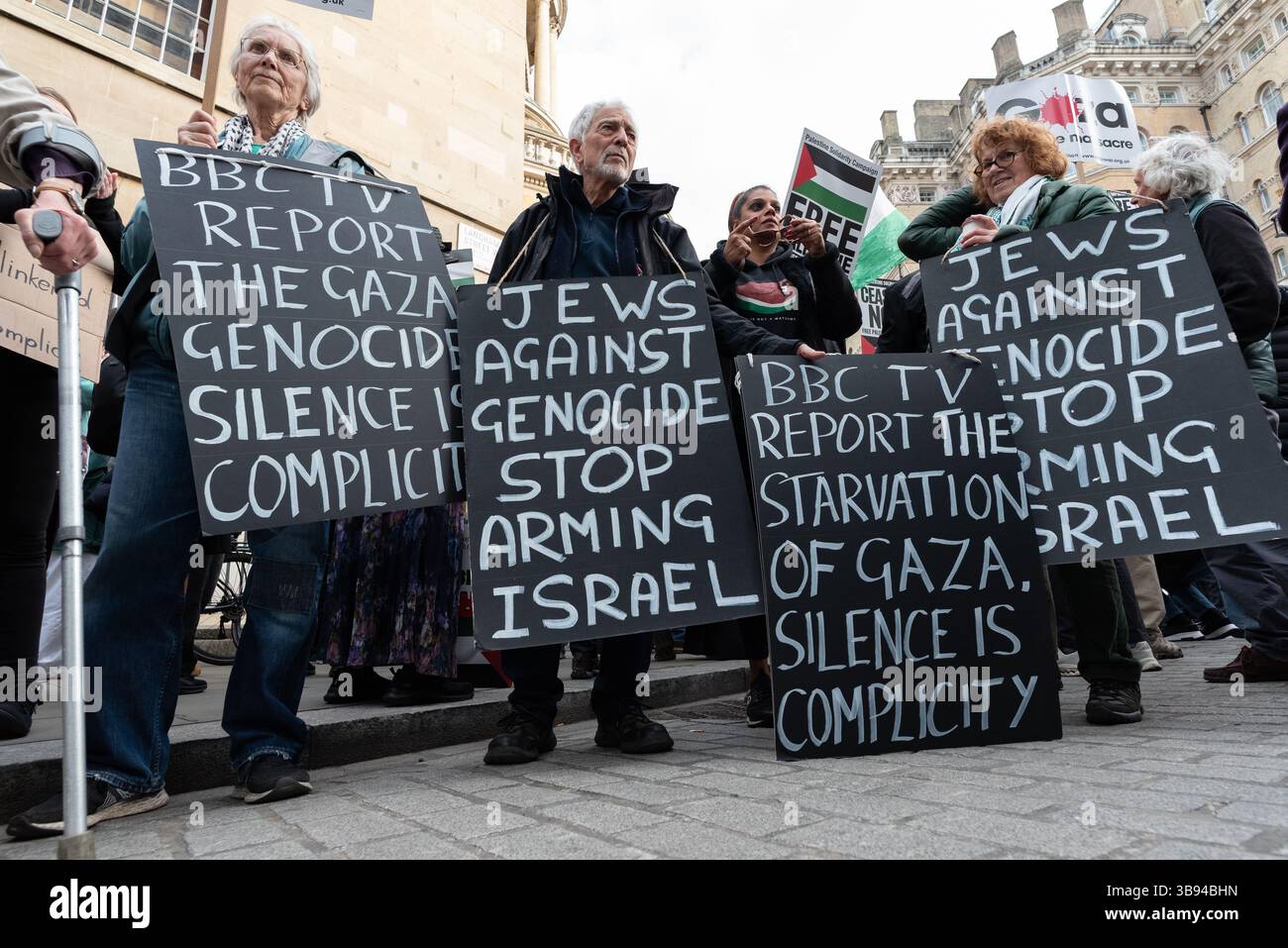London, UK. 8 May, 2025. Jewish people carrying placards join a ...