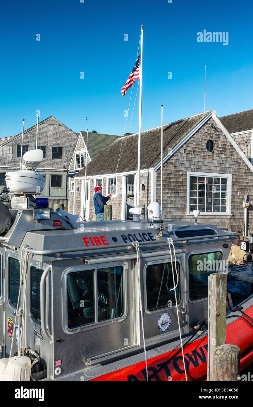 Raising the flag at Edgartown harbor, Martha's Vineyard Stock Photo - Alamy