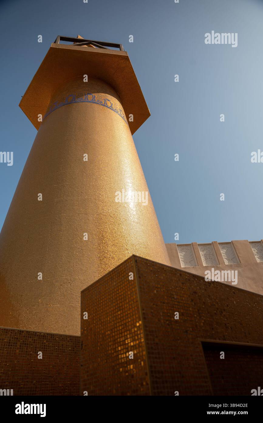 The stunning Golden Mosque in Katara Cultural Village, Doha, Qatar, with its shimmering golden ...