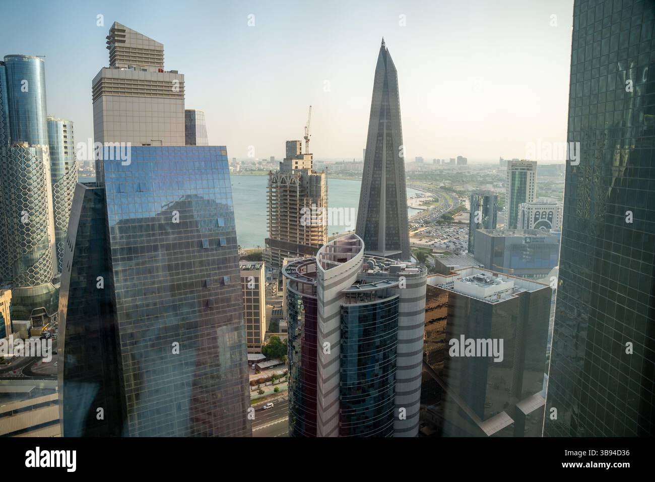 A stunning view of the Doha skyline from the top of a skyscraper window ...