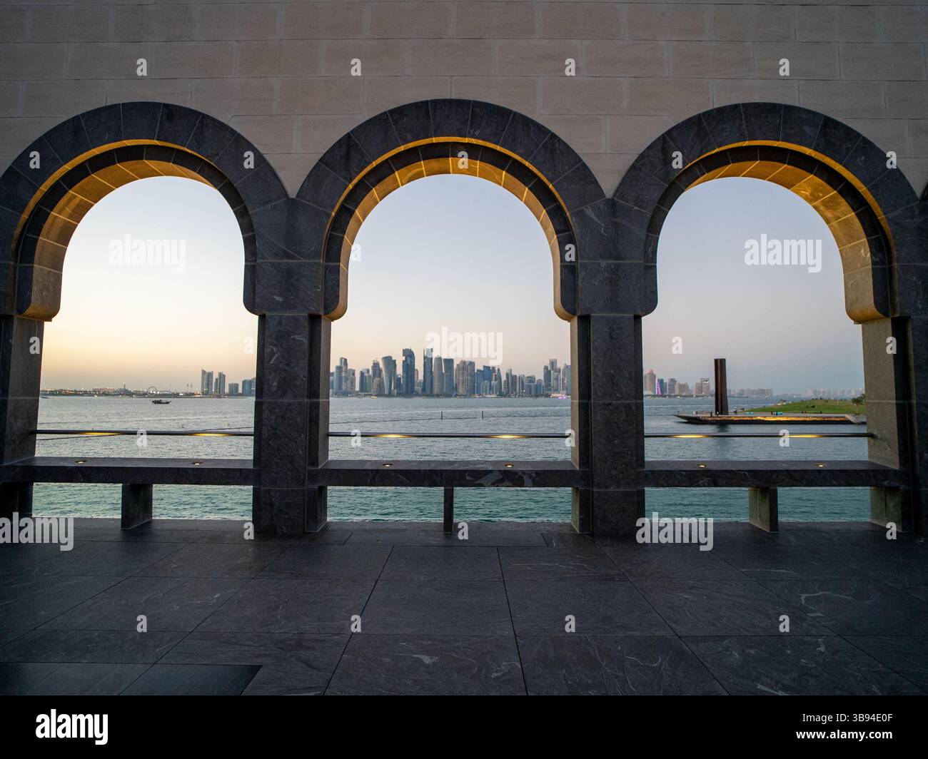 Arches overlooking the city Doha, Qatar. Breathtaking views of the Doha ...