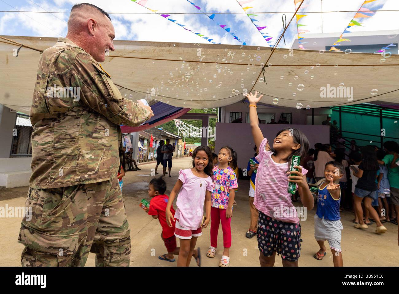 May 5, 2025 - Philippines - Army Master Sgt. Chris E. Roach blows ...