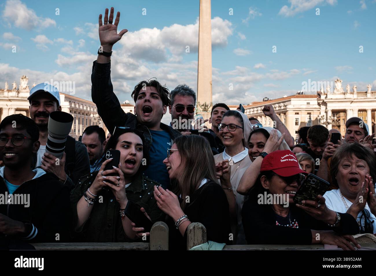 Vatican, people joyfully celebrate te white smoke from chimney on roof ...