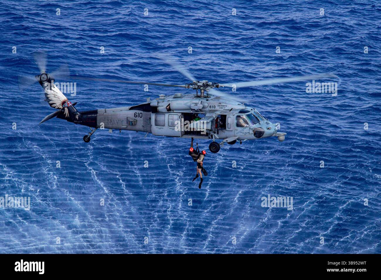 Philippine Sea. 29th Apr, 2025. Search and rescue swimmers are lifted ...