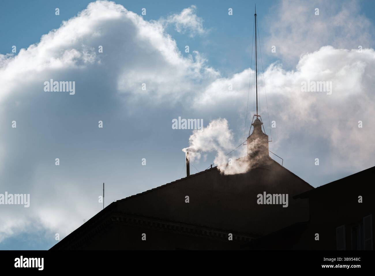 Vatican, the chimney on the roof of the Sistine Chapel announces the ...
