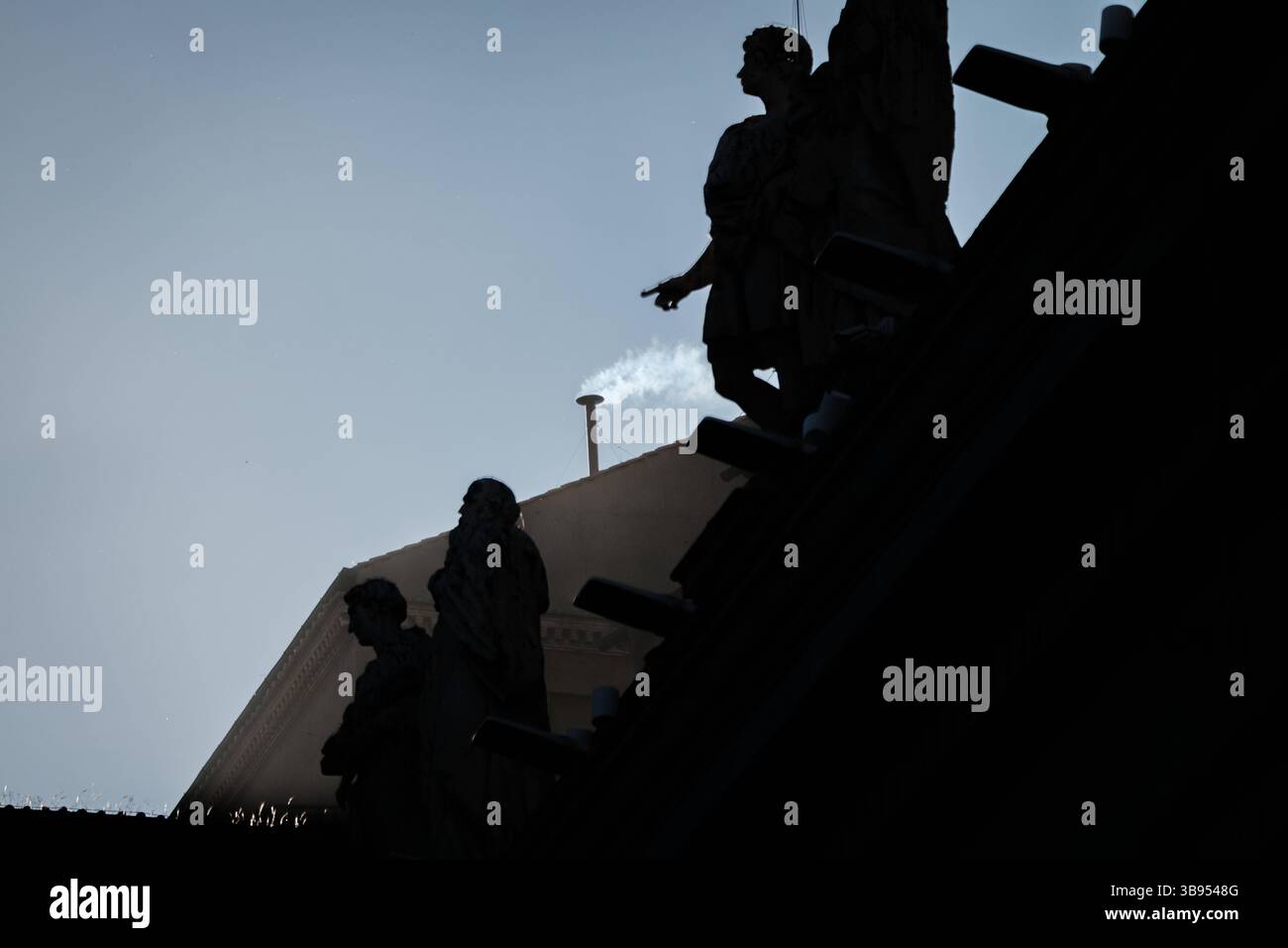 Vatican, the chimney on the roof of the Sistine Chapel announces the ...