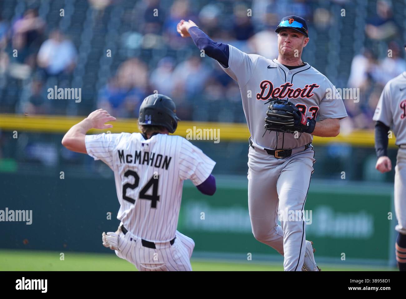 Detroit Tigers second baseman Colt Keith, right, throw to first base ...