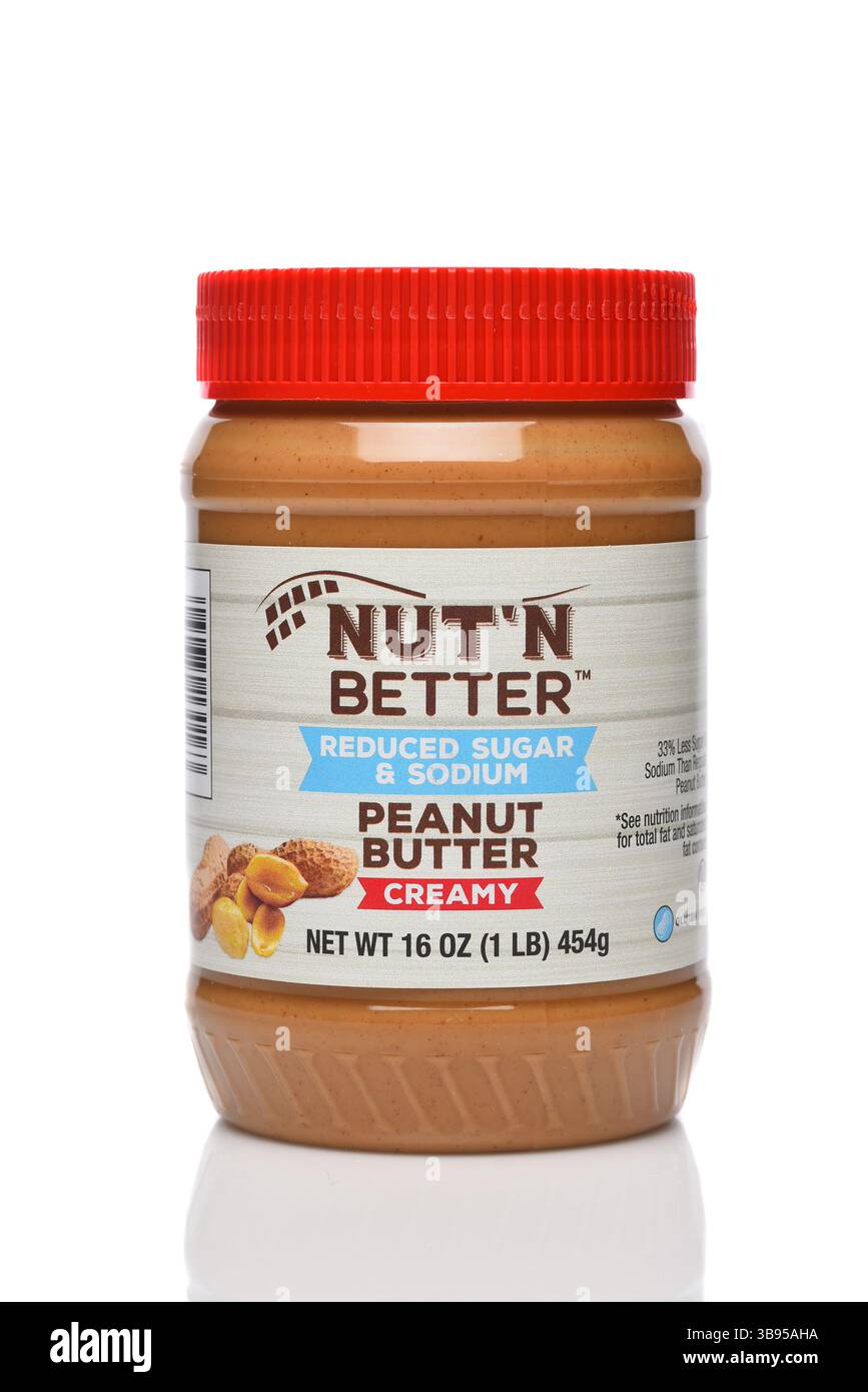 IRVINE, CALIFORNIA - 8 MAY 2025: A jar of Nutn Better Creamy Peanut Butter, reduced sugar and ...