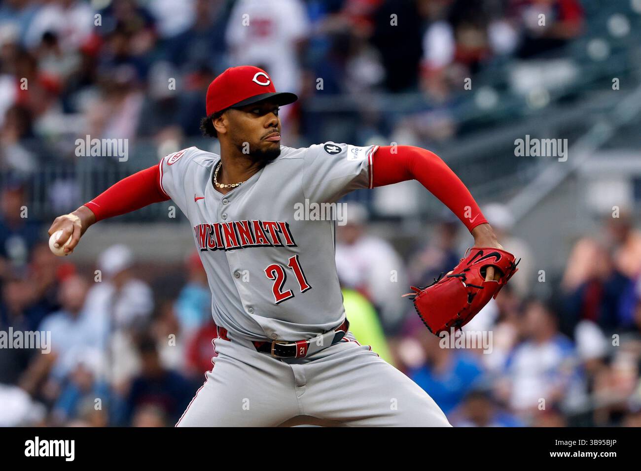 Cincinnati Reds' Hunter Greene pitches during the first inning of a ...