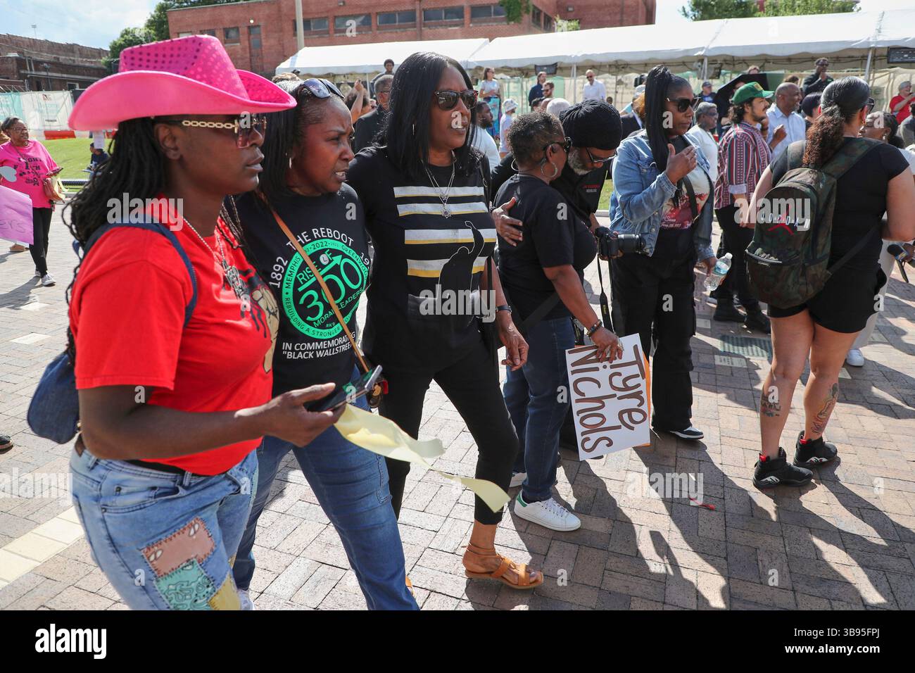 Mother of Tyre Nichols, RowVaughn Wells, center, attends a community ...