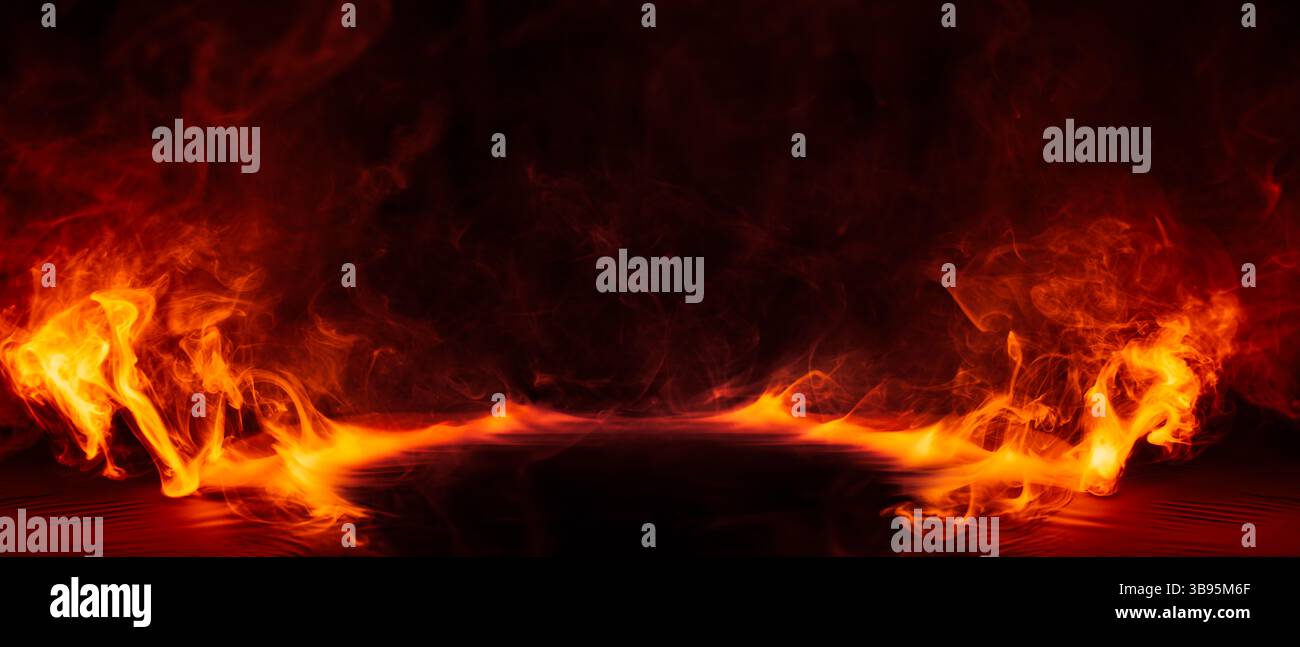 Dramatic fire and smoke effect glowing red and yellow colors exploding ...
