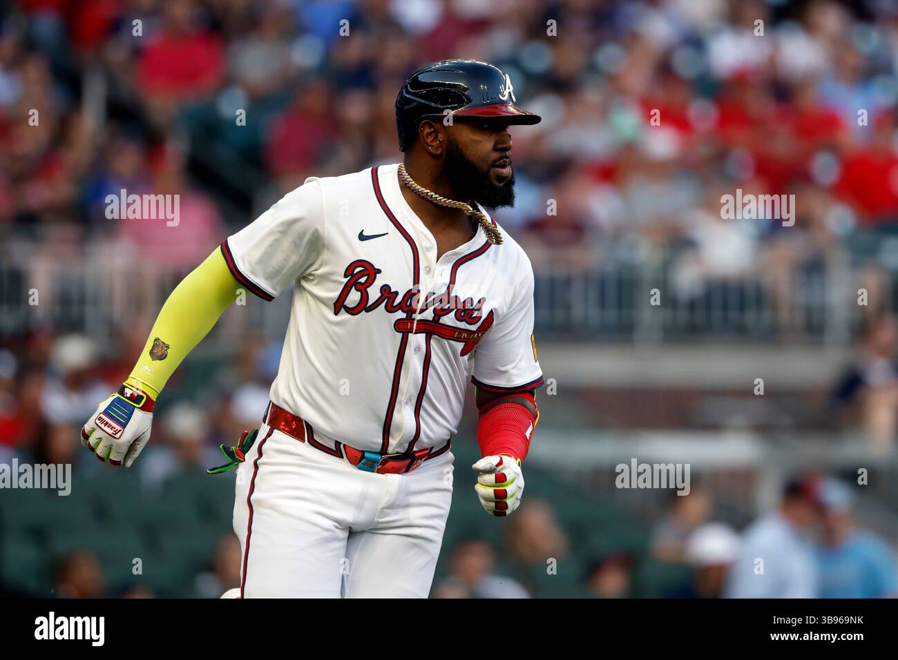 Atlanta Braves' Marcell Ozuna runs to first base on a single during the ...
