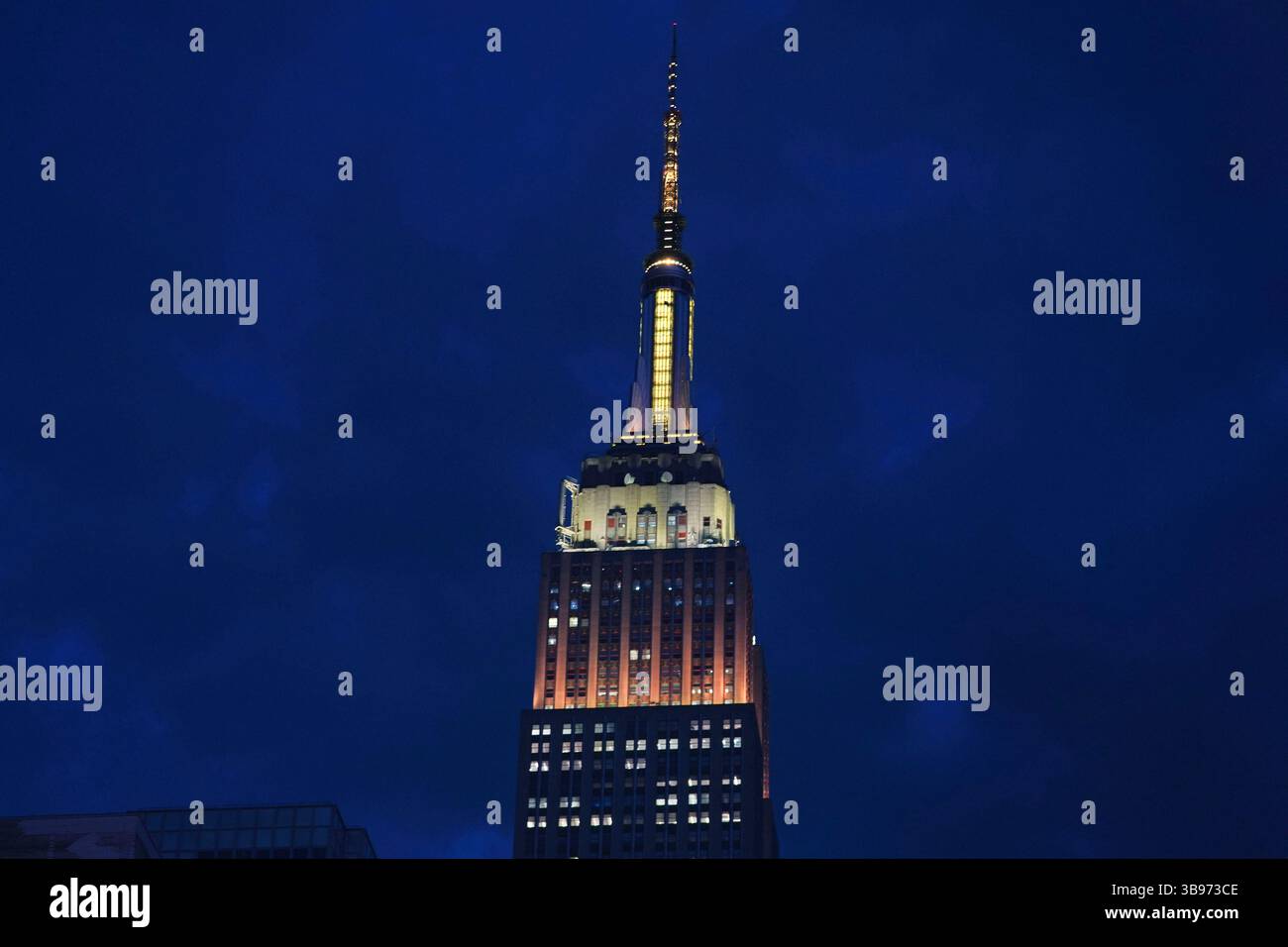The Empire State Building is lit in gold and white in honor of Pope Leo ...