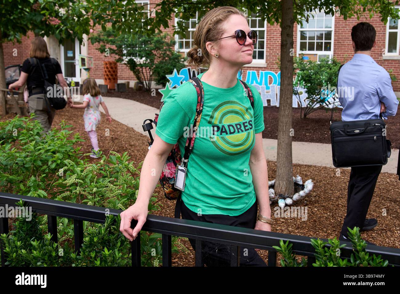 A member of the PTO at Mundo Verde Public Charter School wears a shirt ...
