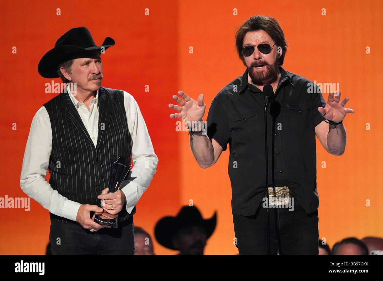 Kix Brooks, left, and Ronnie Dunn of Brooks & Dunn accept the award for ...
