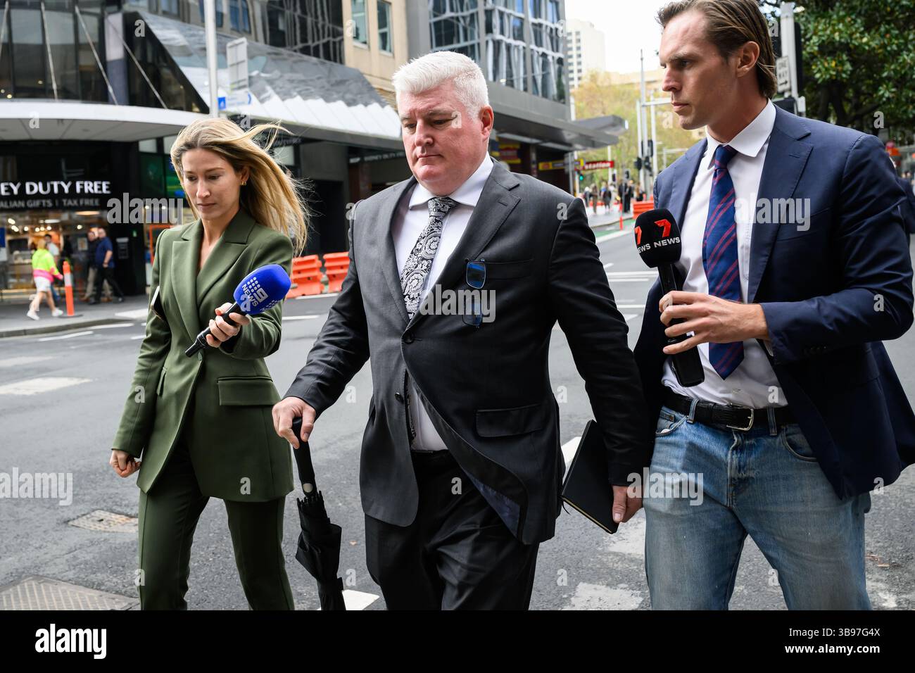 Sydney, Australia. 09th May, 2025. Stuart MacGill (centre) departs the ...