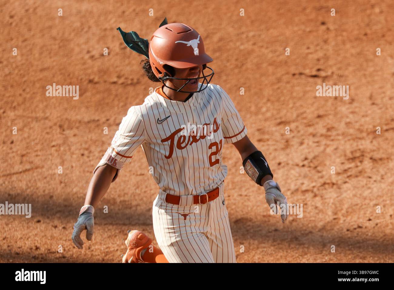 ATHENS, GA - MAY 08: Texas outfielder Kayden Henry (21) runs into home ...