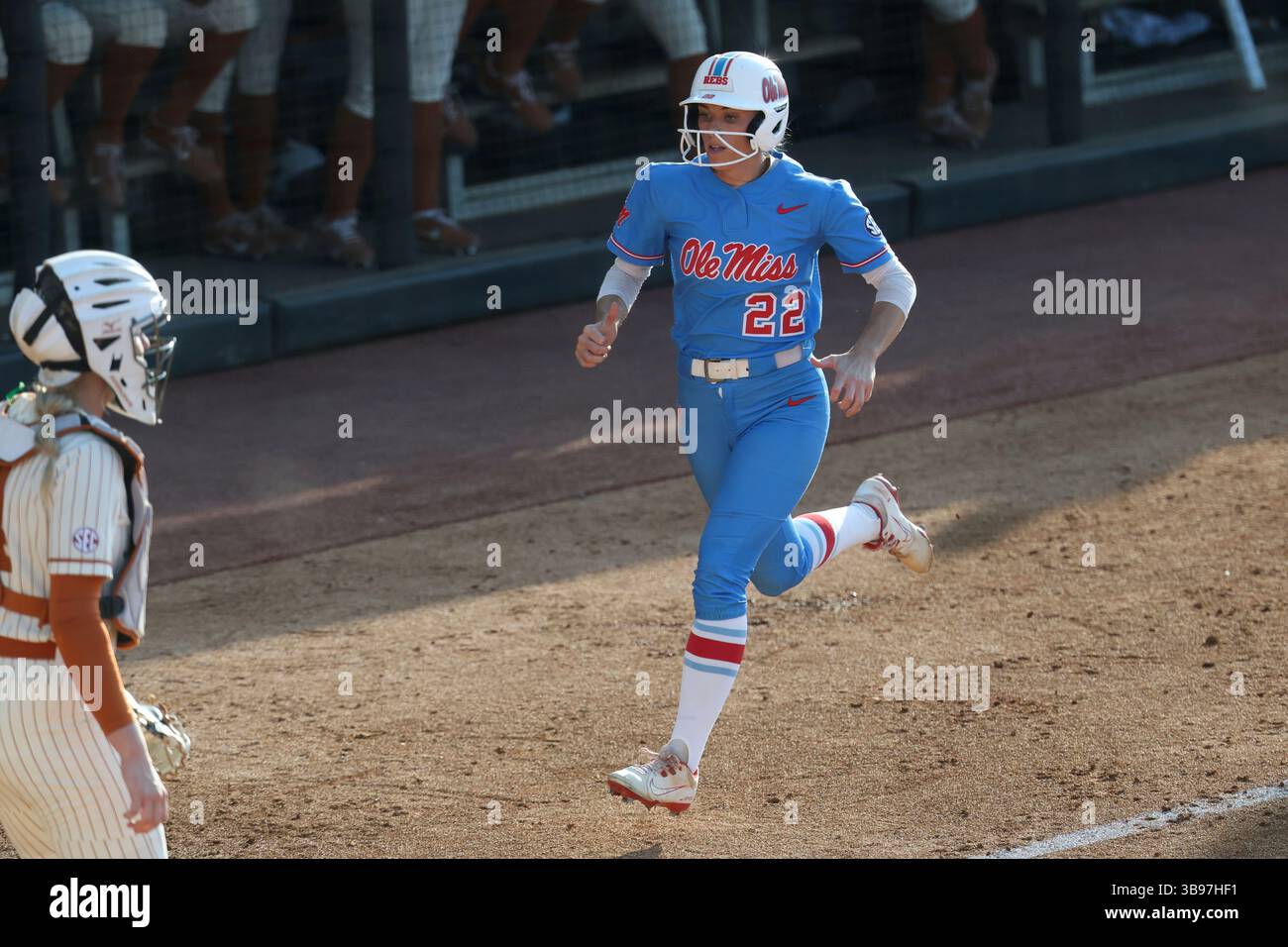 ATHENS, GA - MAY 08: Ole Miss outfielder Taylor Malvin (22) runs into ...