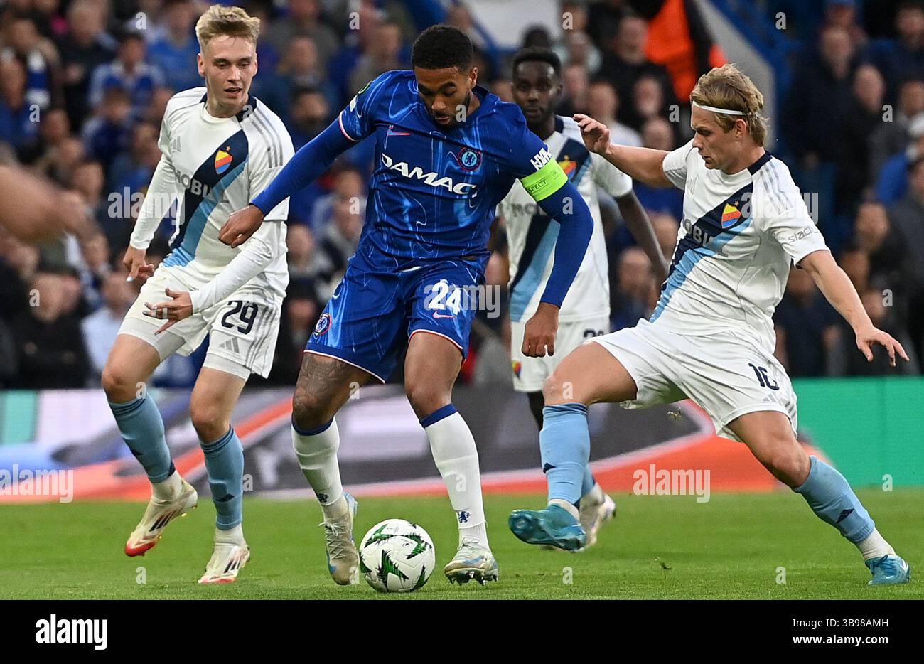 London, Britain. 8th May, 2025. Chelsea's Reece James (C) vies for the ...