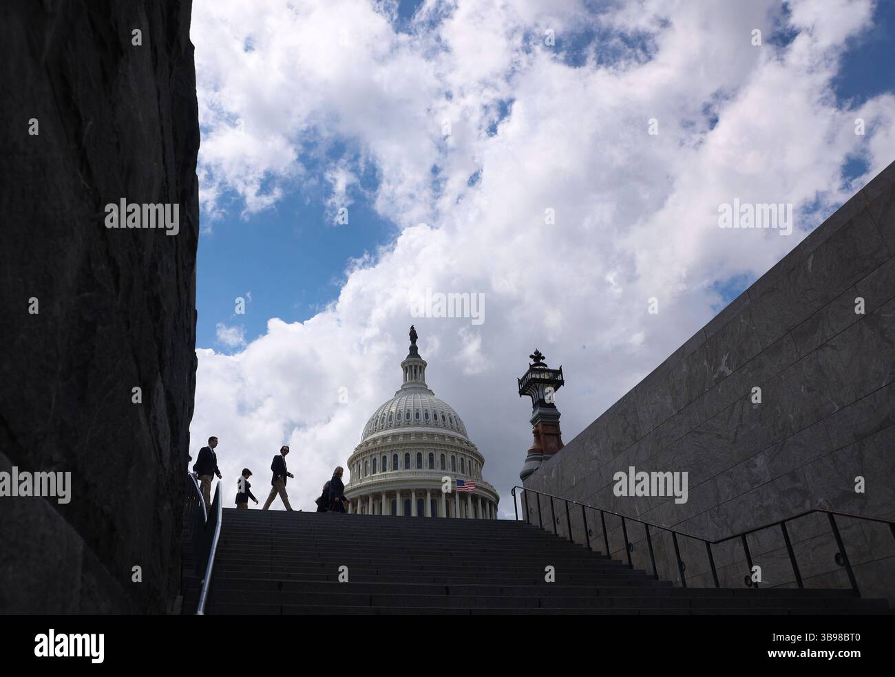 US Capitol in Washington, USA - 06 May 2025. Pedestrians walk past the ...