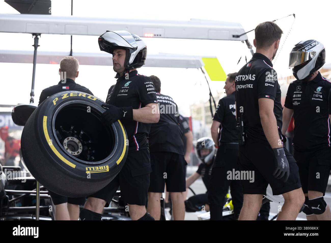 The ferrari pit crew practice pit stops hi-res stock photography and ...