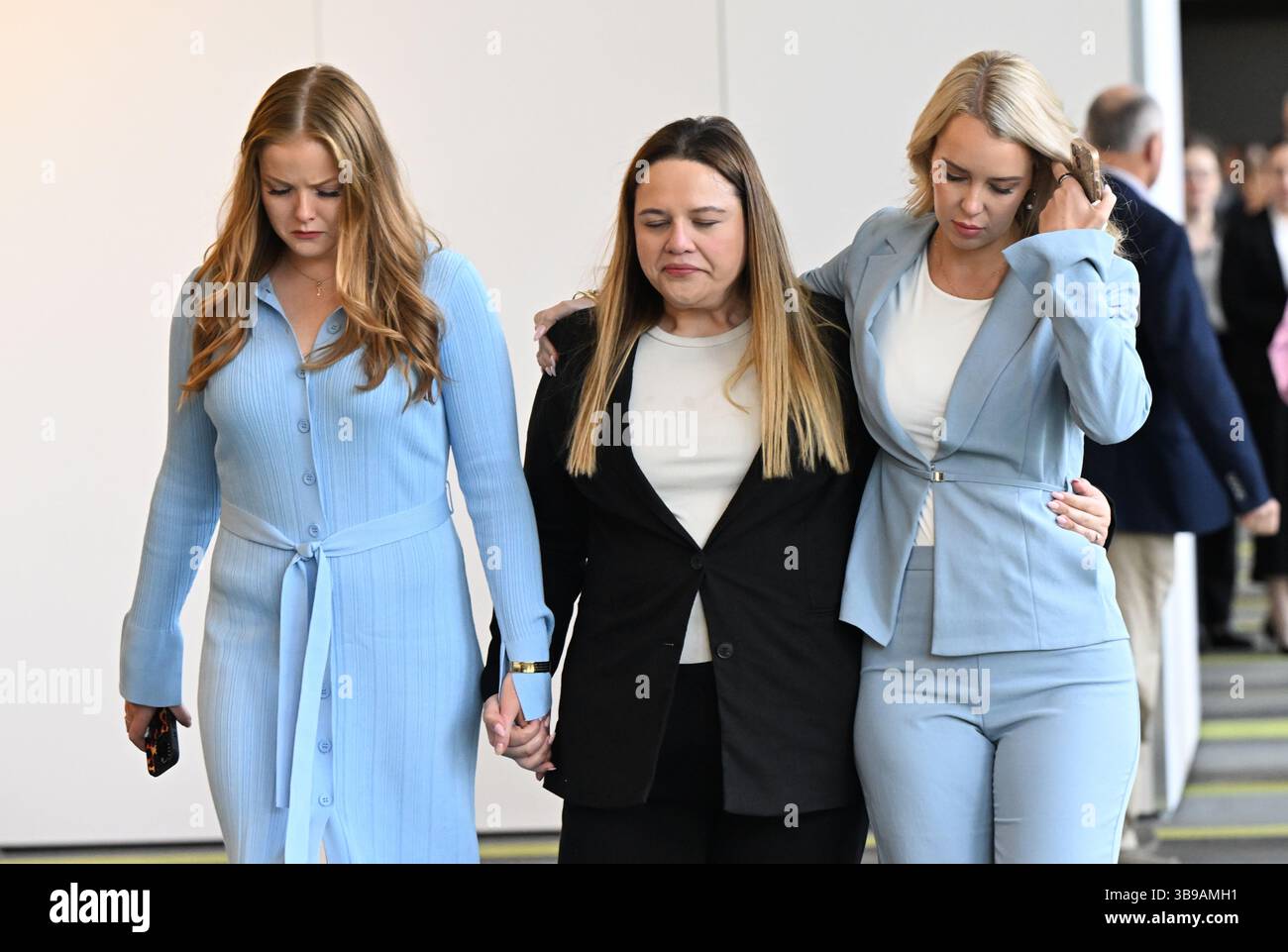 (Left to right) Chadine Whyte, partner of LT Max Nugent, Sarah Loft ...