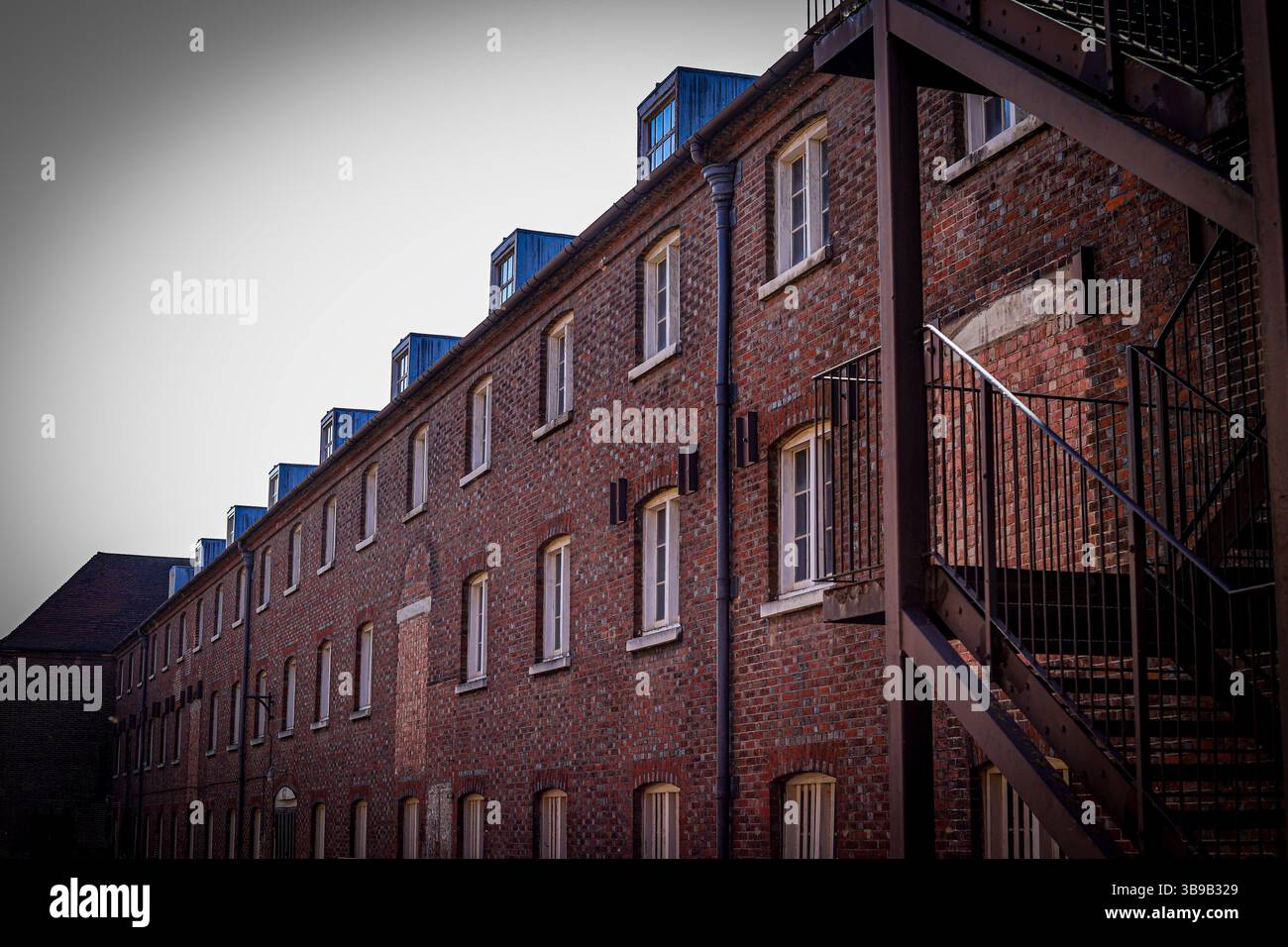 Industrial red brick buildings and chimneys of Chatham Historic ...