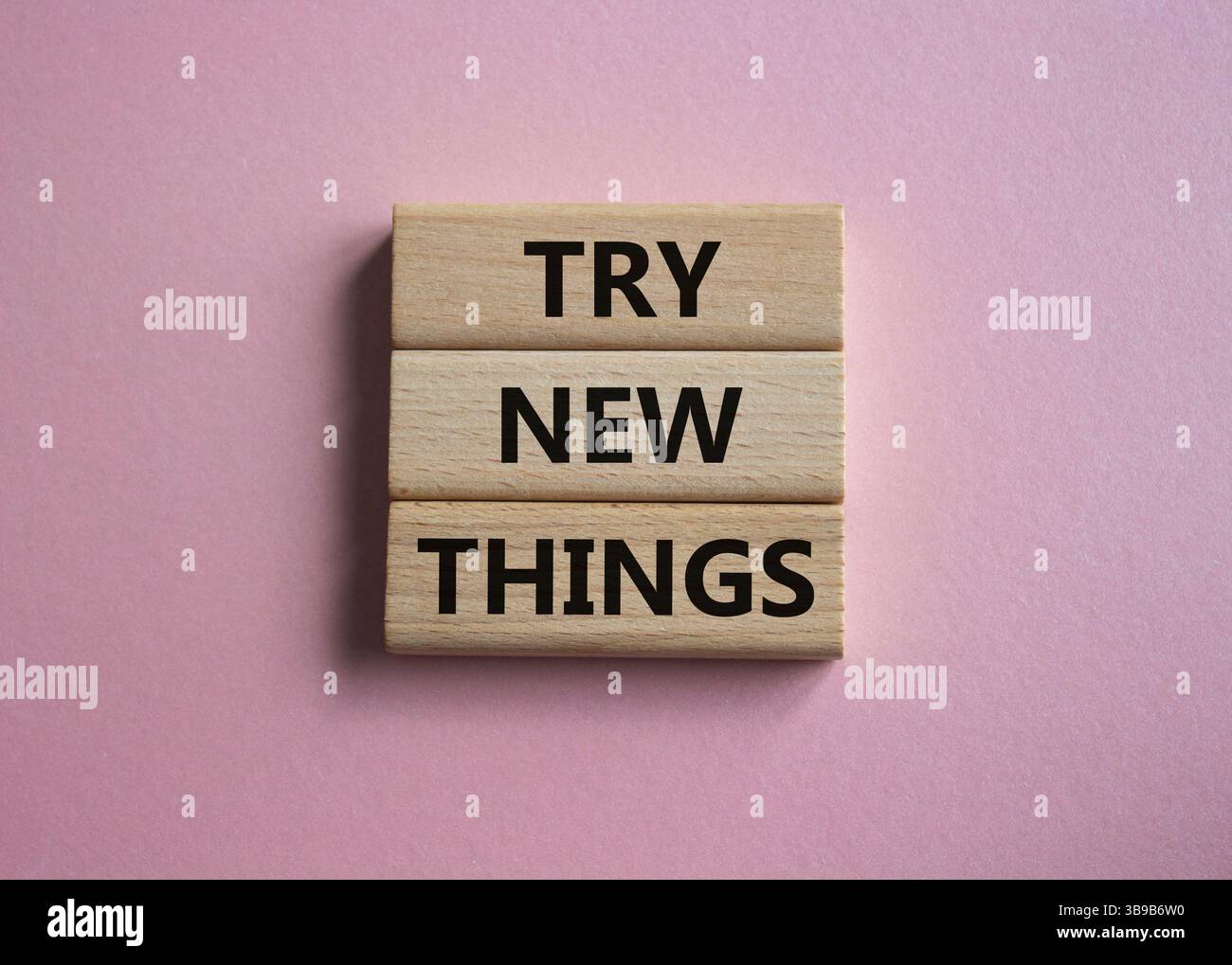 Try new Things symbol. Concept words Try new Things on wooden blocks ...