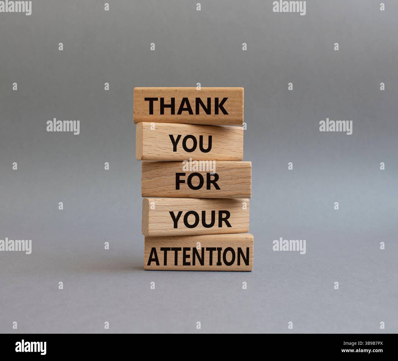 Attention symbol. Wooden blocks with words Thank you for your attention ...