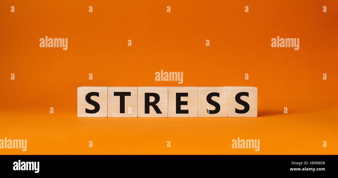Stress symbol. Concept word Stress on wooden cubes. Beautiful orange ...