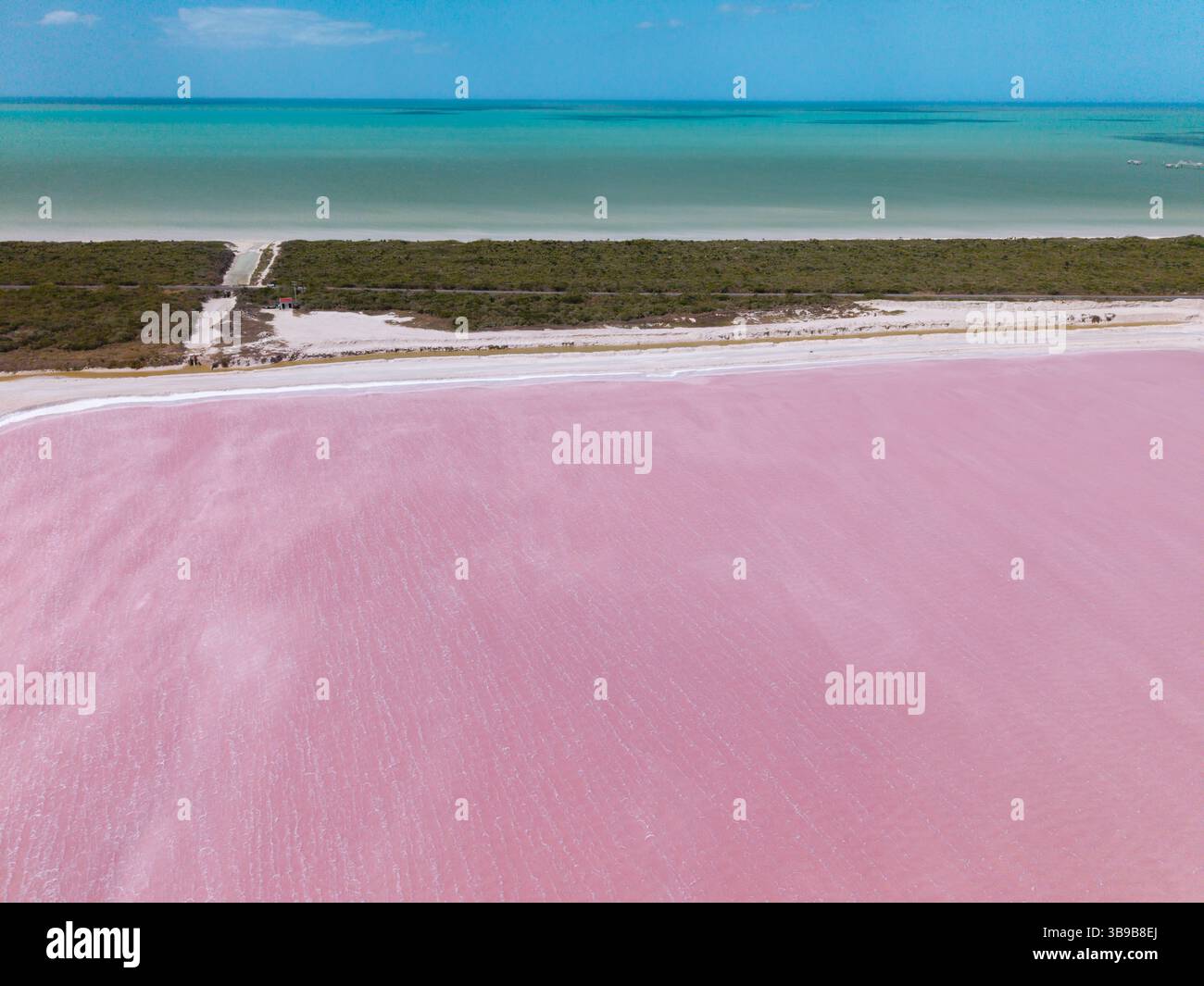 Pink lakes of Las Coloradas and the azure blue sea, Mexico Stock Photo ...