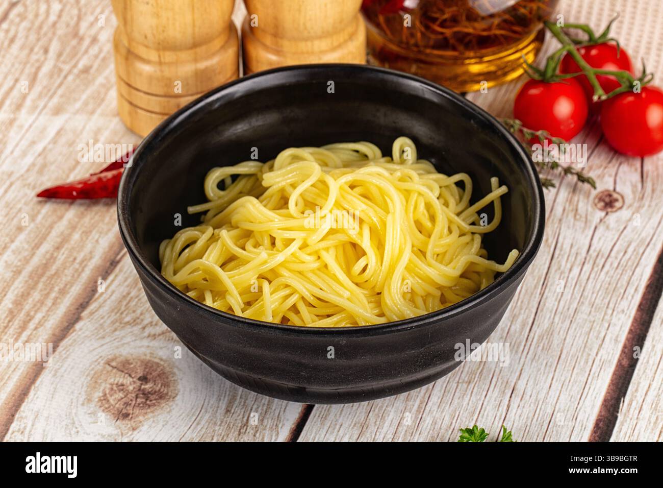 Asian cuisine Boiled yellow egg noodles in the bowl Stock Photo - Alamy