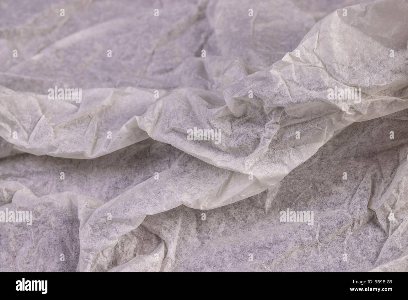 crumpled paper after prolonged use, thin paper made of cellulose as a ...