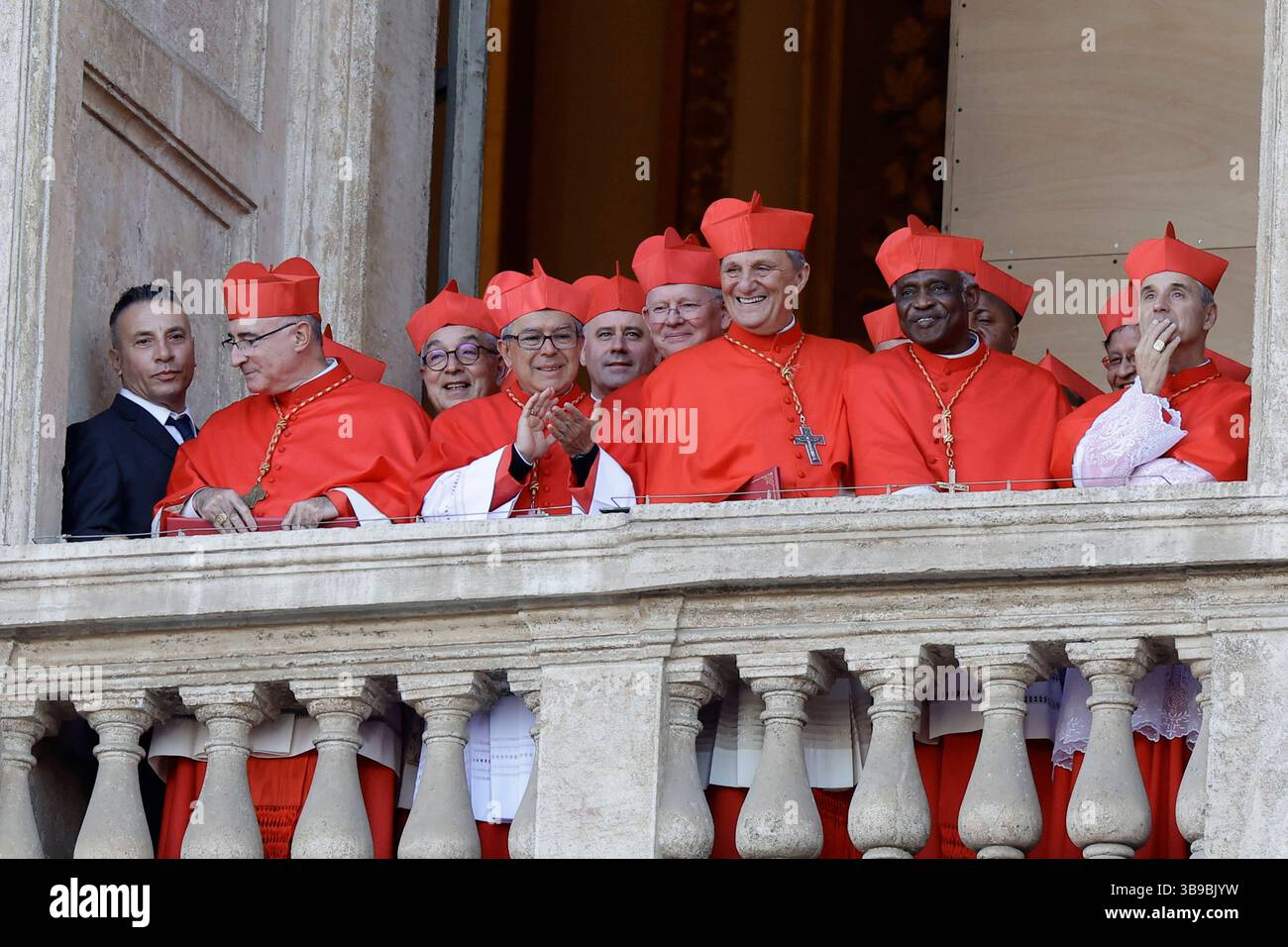 VATICAN POPE VOTE CONCLAVE Cardinals react from a balcony of the St ...
