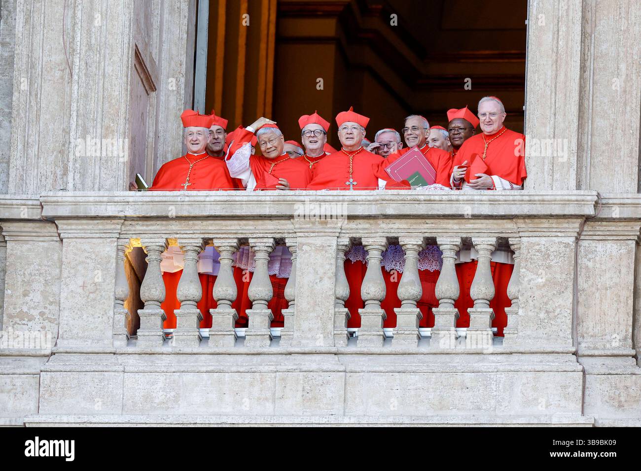 VATICAN POPE VOTE CONCLAVE Cardinals react from a balcony of the St ...