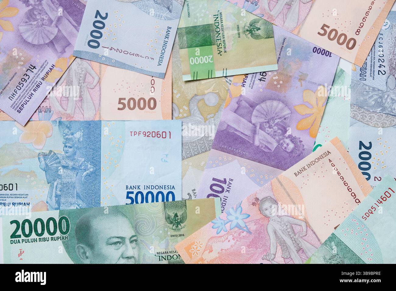 Collection of Indonesian rupiah banknotes for background Stock Photo ...