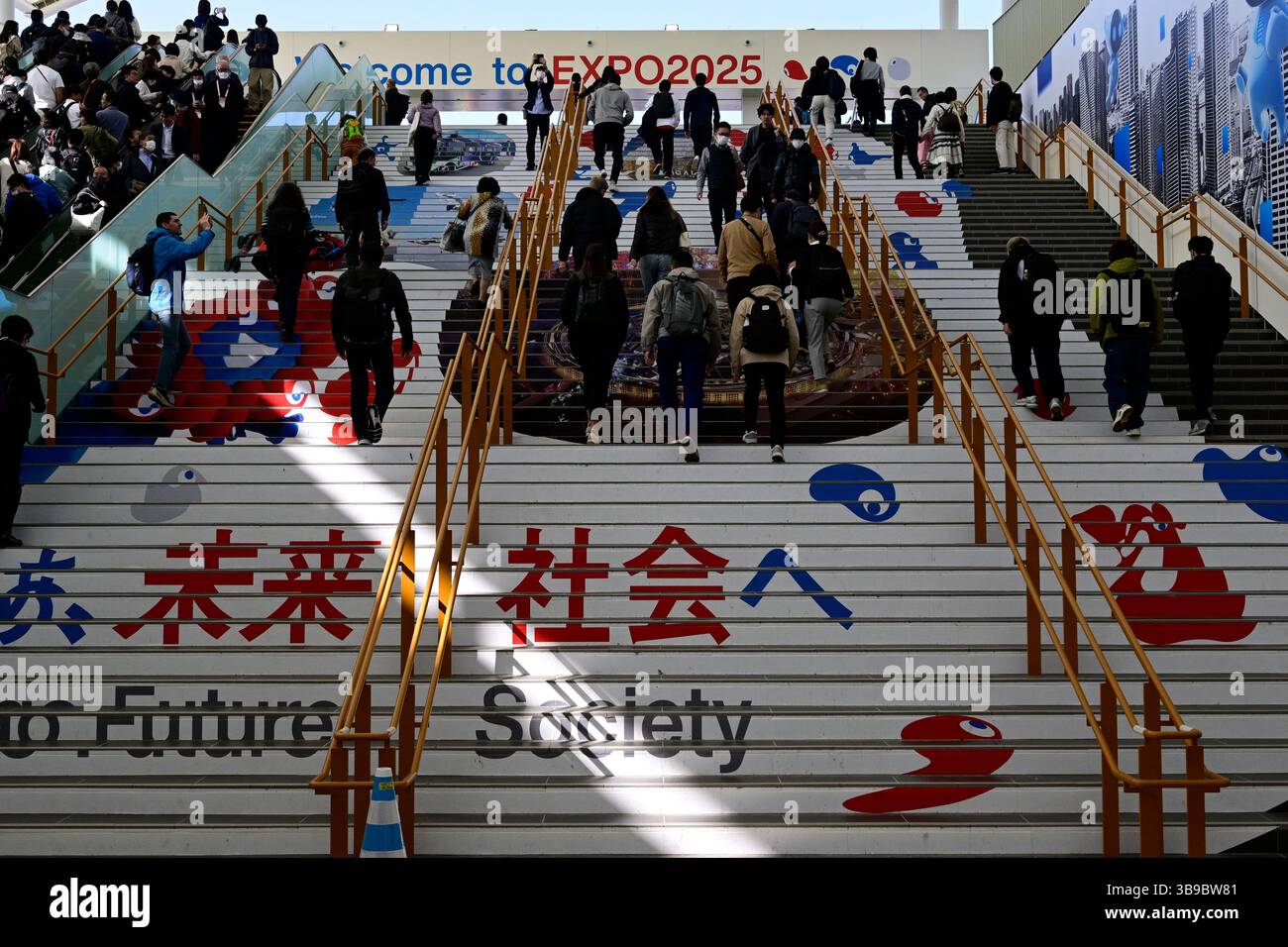 A poster for Osaka World Expo 2025 on the exit stairs of a subway ...
