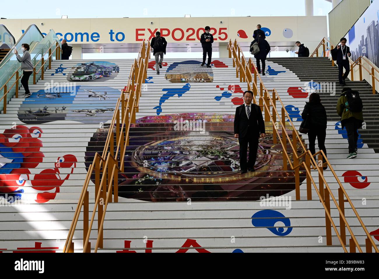 A poster for Osaka World Expo 2025 on the exit stairs of a subway ...