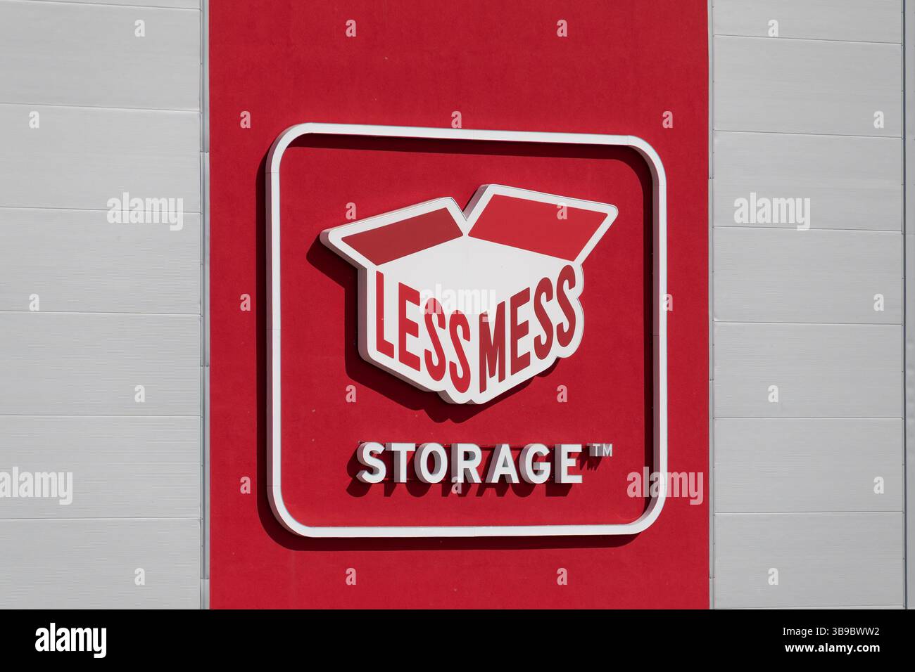 Less mess storage logo on red and gray building exterior. May 6, 2025 ...