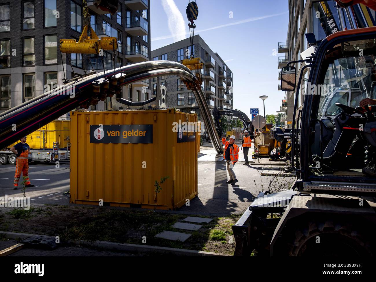 AMSTERDAM - Casing tubes for electricity cables are being pulled into a ...