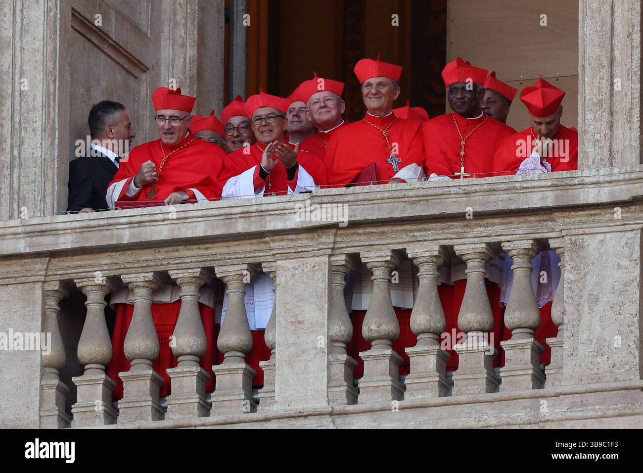 Rome, Italy. 08th May, 2025. Cardinals stand on the side balcony of St ...