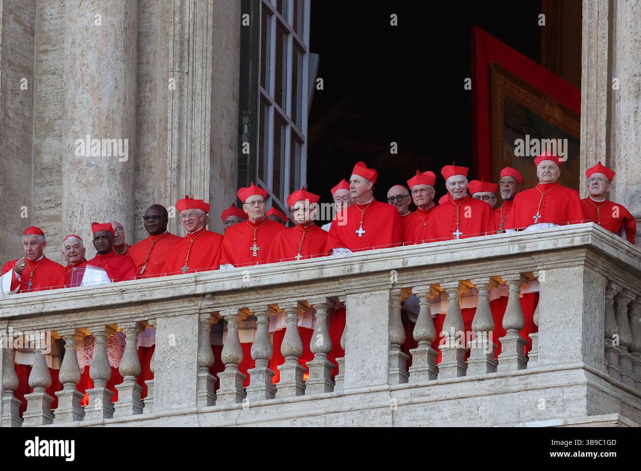 Rome, Italy. 08th May, 2025. Cardinals stand on the side balcony of St ...